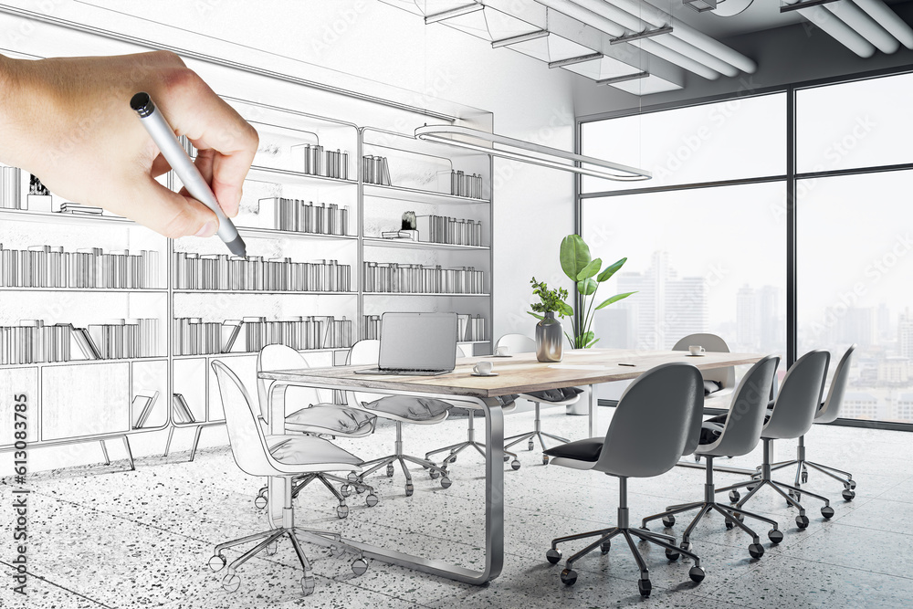 Handwritten sketch of modern meeting room interior design with man hand ...
