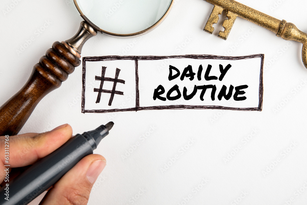 Daily Routine Concept. Magnifying glass and golden key on white ...