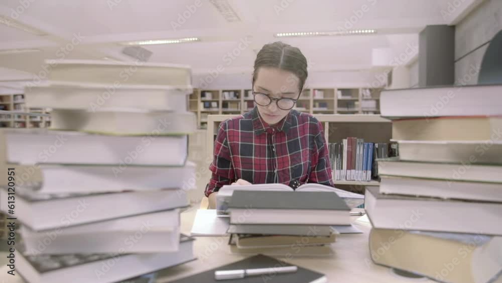 Student clap her hands, smiles and triumph raising her hands up.Now she ...