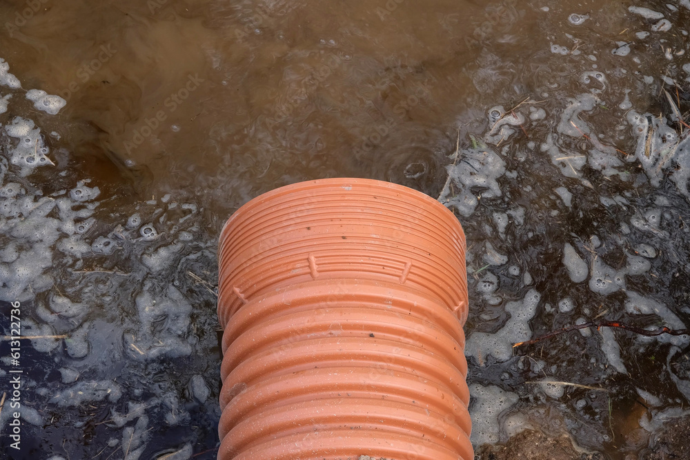 Drainage pipe with water stream flowing. Storm water management in ...