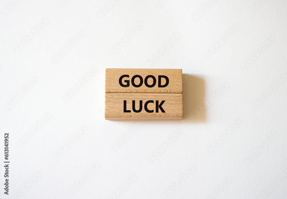 Good luck symbol. Wooden blocks with words Good luck. Beautiful white ...