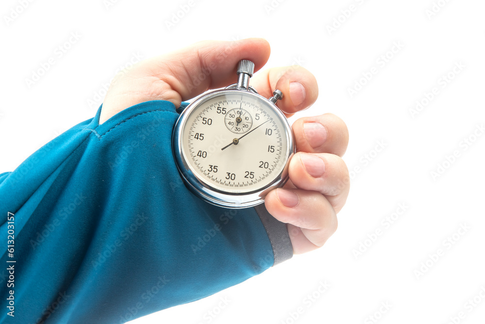 hand with a mechanical analog stopwatch on a white background. Time ...