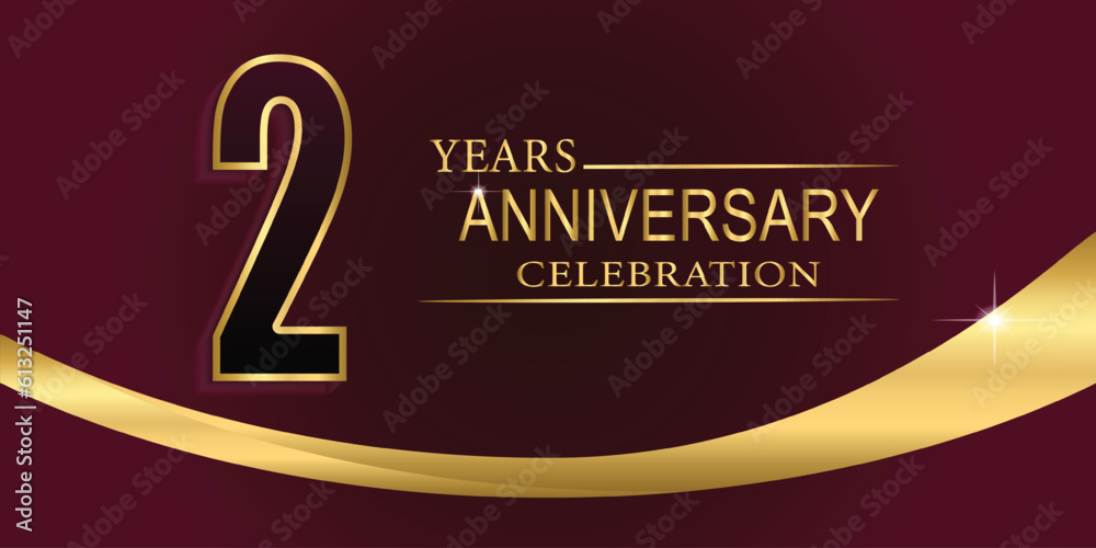 2nd Year anniversary celebration background. Golden lettering and a ...