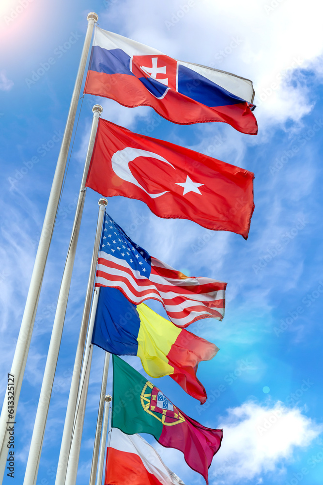 Group of flags of various states - as a symbol of world cooperation ...
