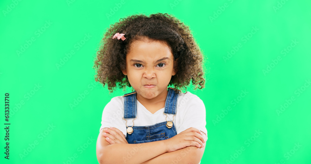 Child, angry and face with arms crossed on green screen with attitude ...