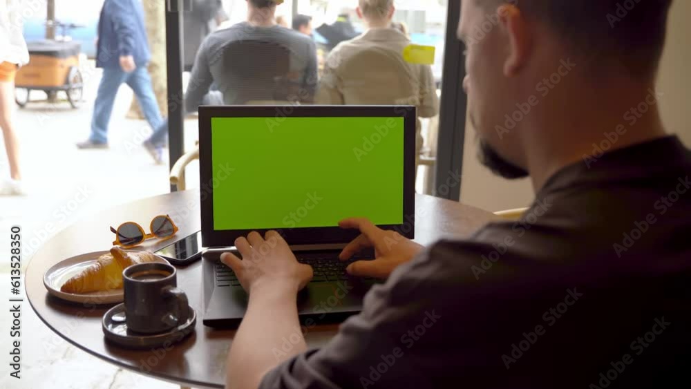 Man using scrolling social media typing laptop, freelancer remote ...