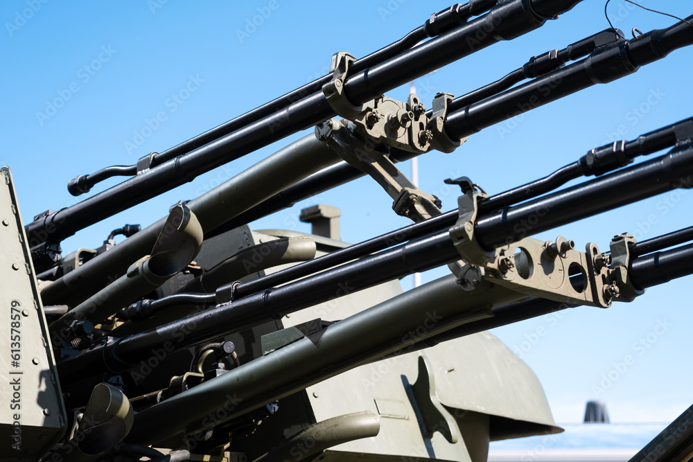 Foto de Heavy machine gun on a military vehicle, modern military ...