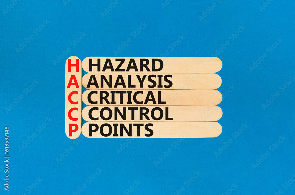 HACCP symbol. Concept words HACCP hazard analysis critical control point on wooden stick ...