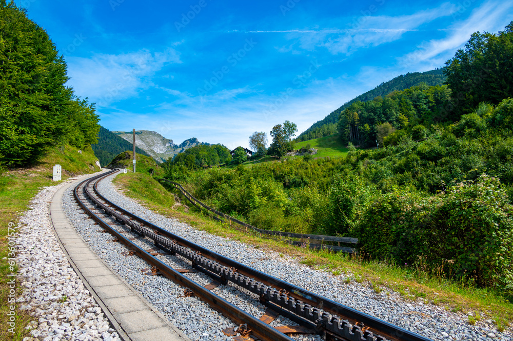 View of Schafberg train and railways. SCHAFBERGBAHN Cog Railway running ...