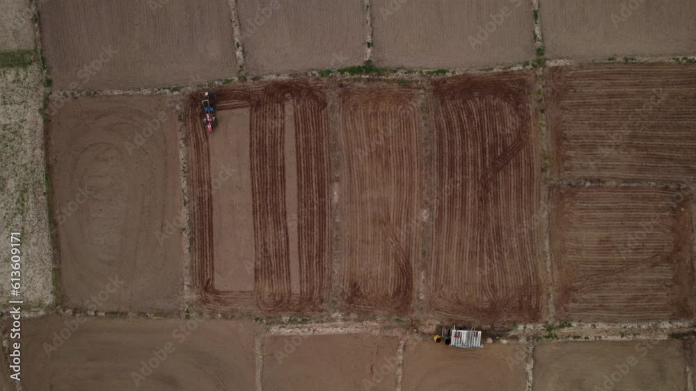 Top view of walking tractor is plowing for weed control and farming ...