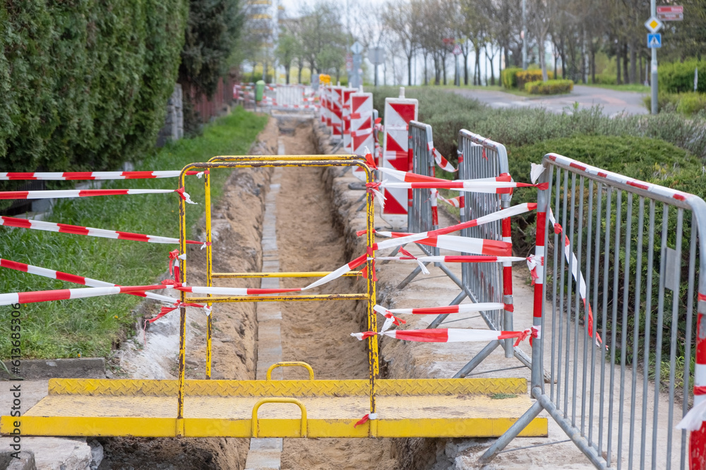 Pedestrian bridge over underground electric cable installation ...