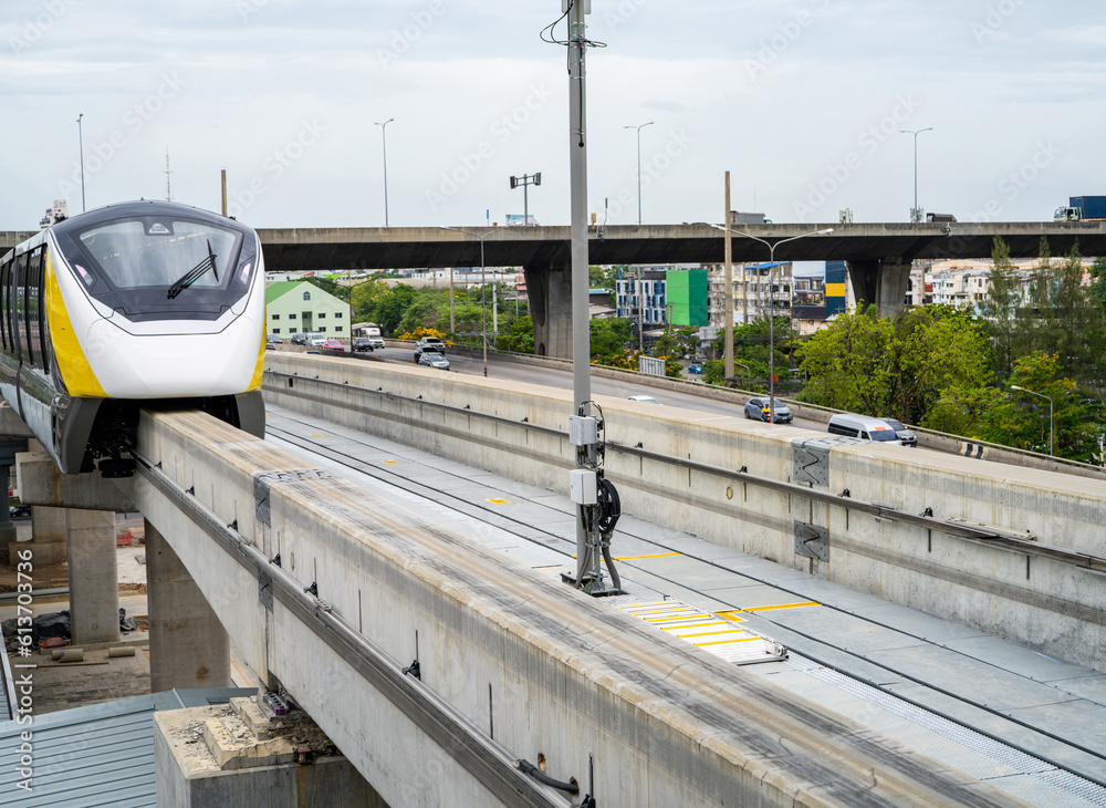 Elevated monorail train on rail. Public transit monorail. Modern mass ...