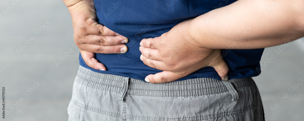 Middle aged old Asian senior man suffering from lower back pain ...