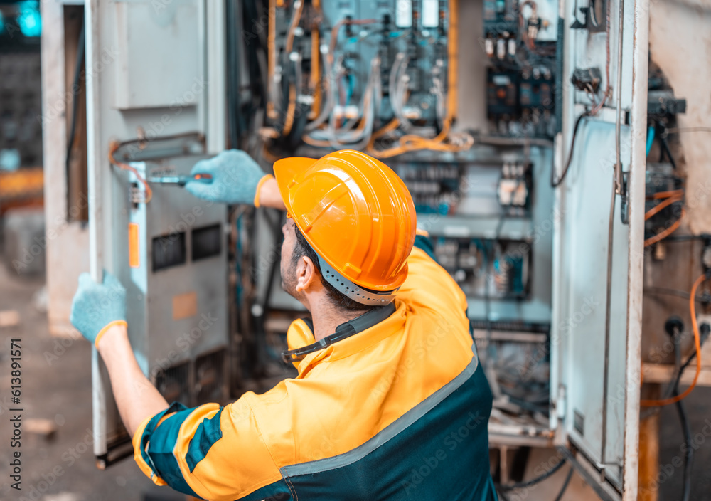 Electrical technician tests wiring, polarity, grounding, voltages and ...