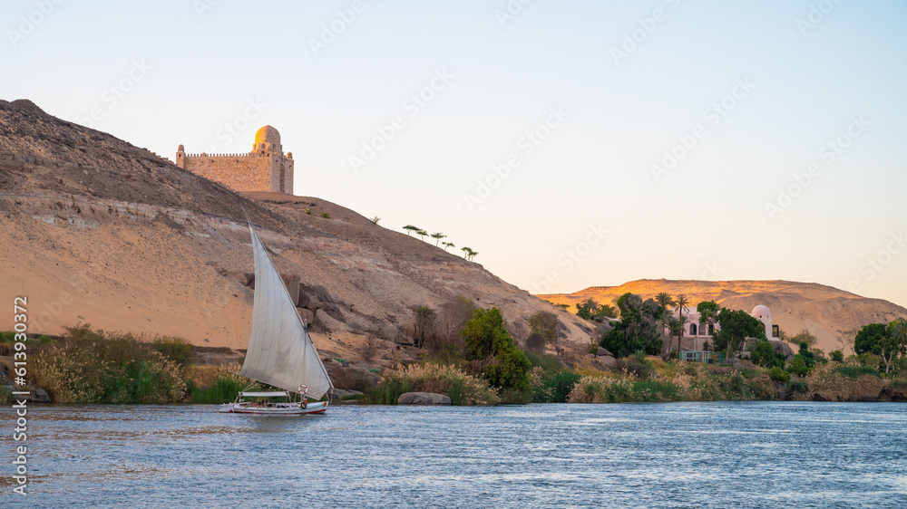 Navigation of the Nile River as it passes through Aswan, Egypt. View of ...