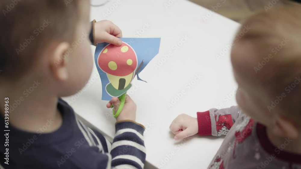 little child toddler learning cut paper scissors color paper cutting ...