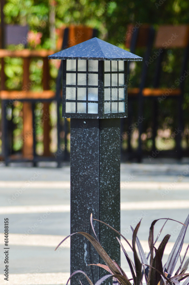 Portrait View Decorative Lamp Post Illuminating The Garden During The ...