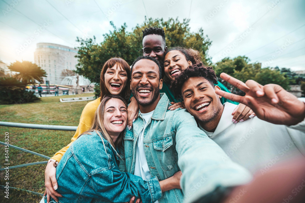 Multicultural friends taking selfie picture outside - Happy young ...