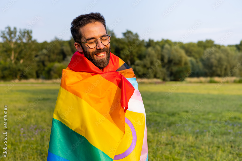 Pride day celebration event. Portrait of a cheerful gay man celebrating ...