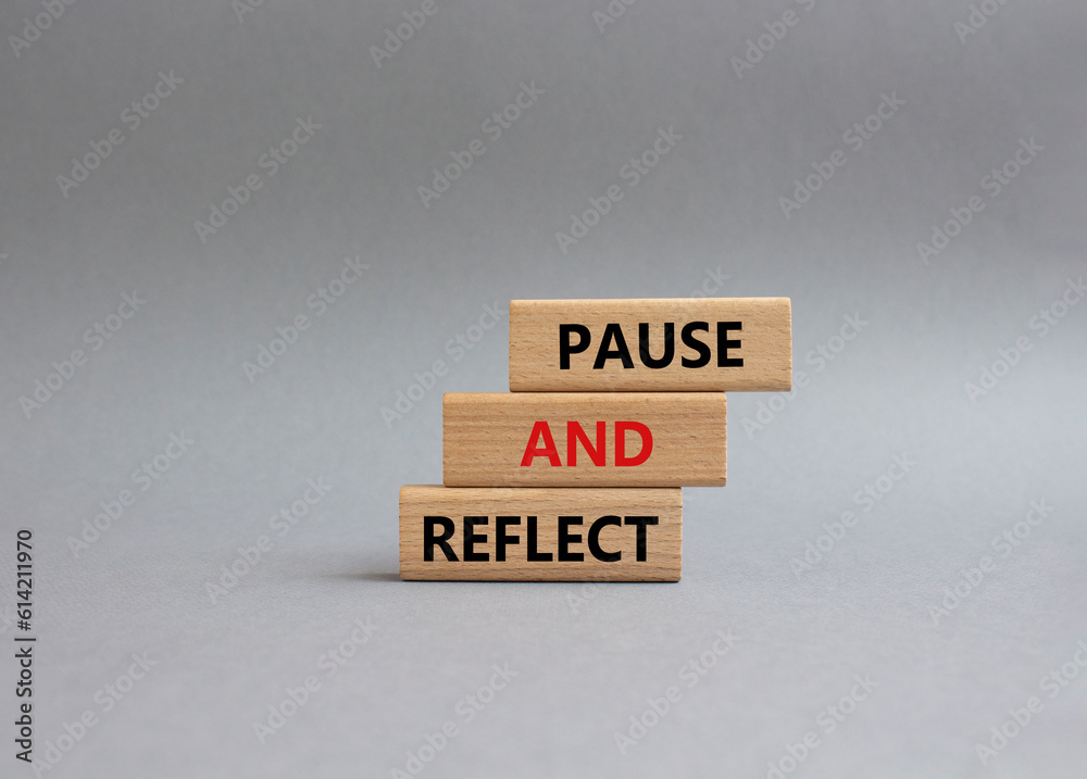Pause and Reflect symbol. Concept words Pause and Reflect on wooden ...
