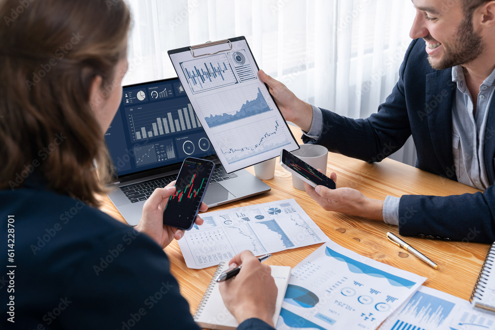 Busy analyst team in office analyzing financial data analysis for ...