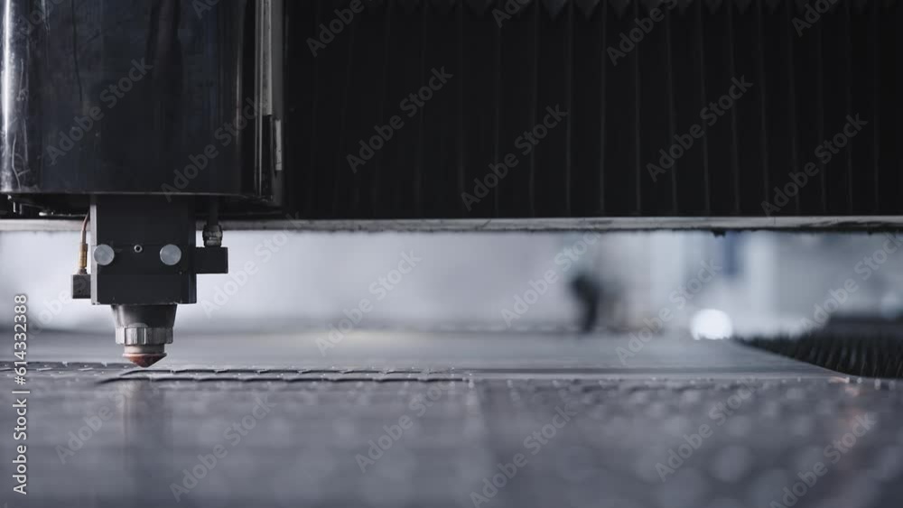 Laser cutting of a sheet of metal using a CNC machine. Ultra-precise ...