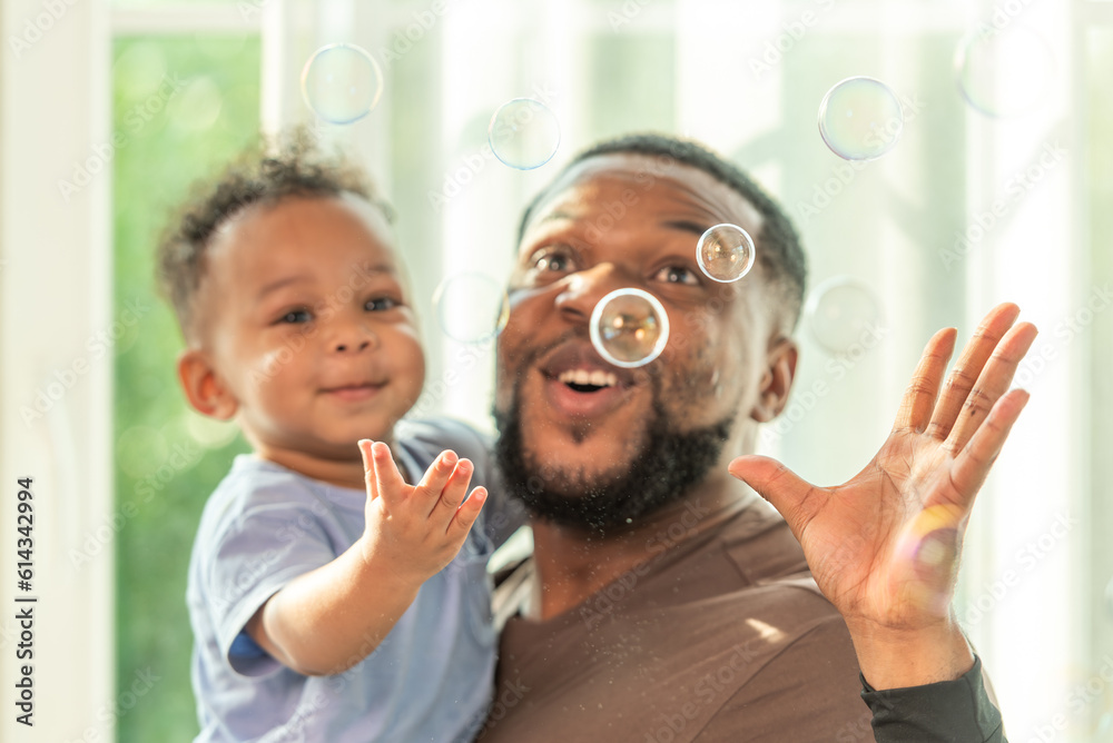 parents dad father throw baby son happy on piggyback and neck riding ...