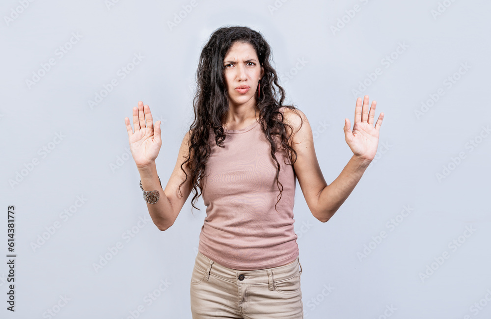 Scared woman with raised hands isolated. Young woman with scared face ...