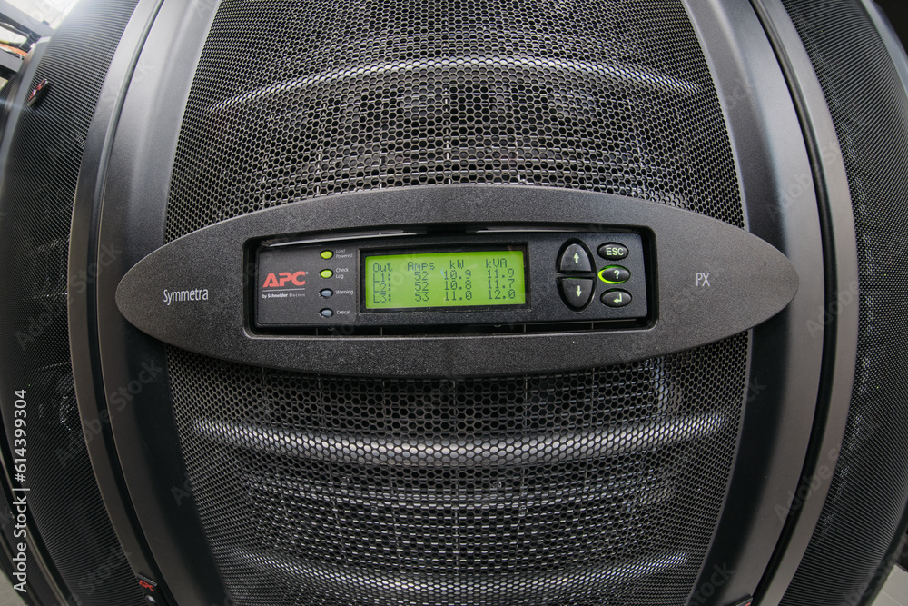 In the server room, the UPS APC battery is connected to an emergency ...