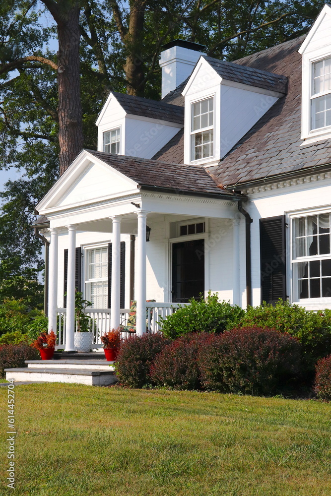 Colonial Home with Dormers and Columns Stock Photo | Adobe Stock