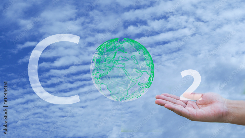 Sky background with hands and the concept of reducing CO2 emissions to ...