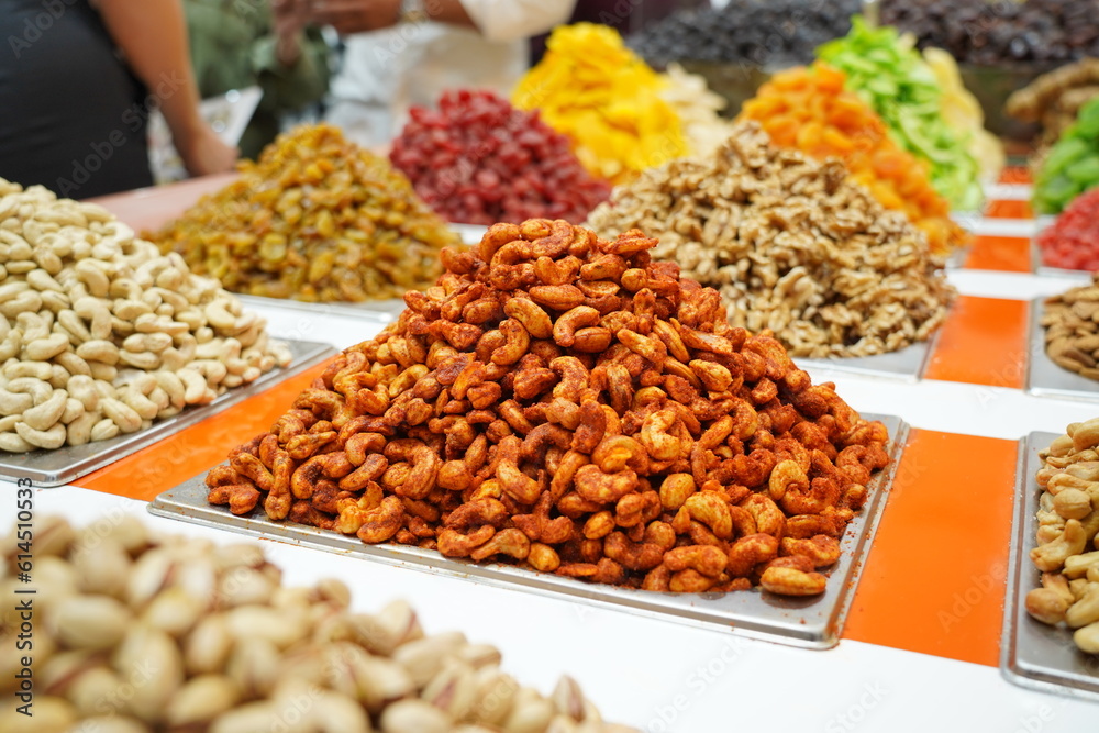 Cashew nuts at the Dubai Market and piles of dried fruits on display ...