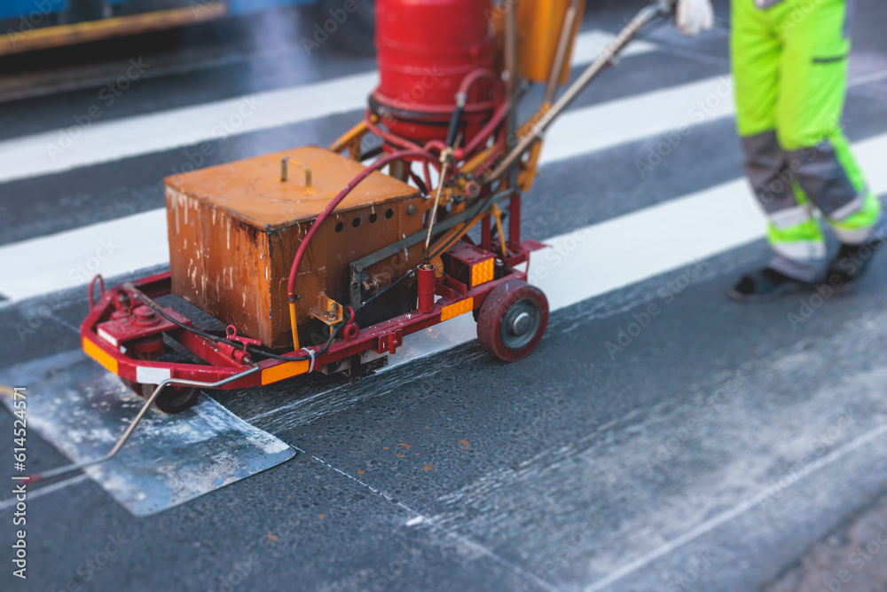 Process of making new road surface markings with a line striping ...