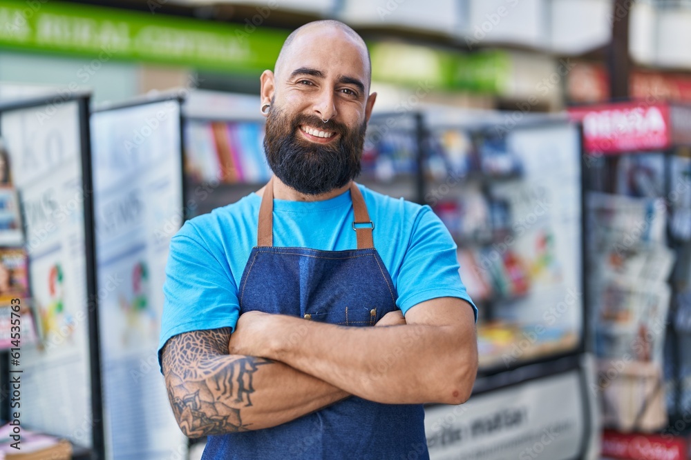 Young bald man waiter smiling confident standing with arms crossed ...