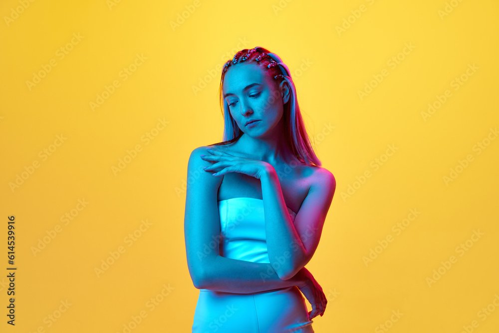 Portrait of pretty, young girl with cute hairstyle, in white clothes ...