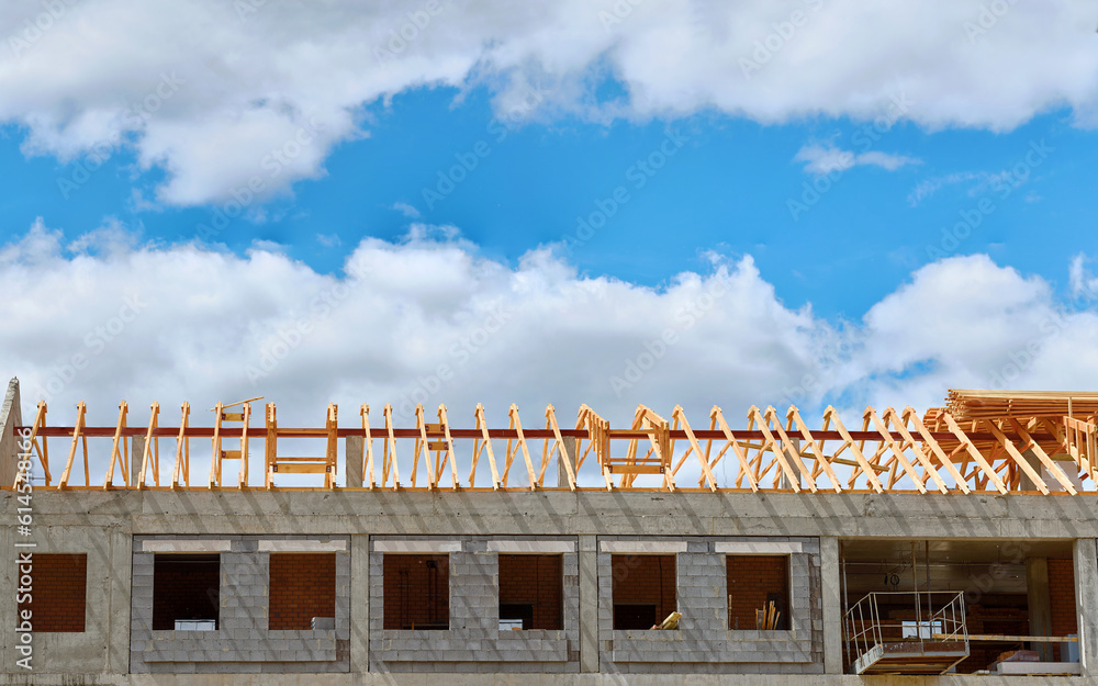 Building construction, roof rafters installation. Install ridge board ...