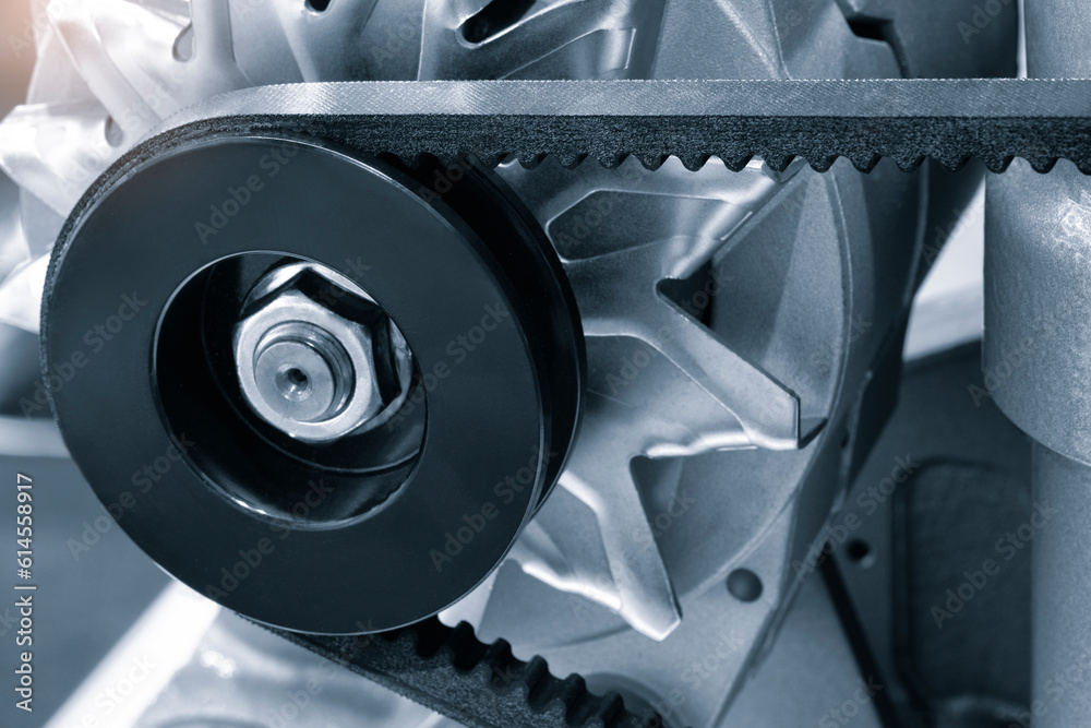 Belt drive of Diesel engine electric generator. Close up car timing ...