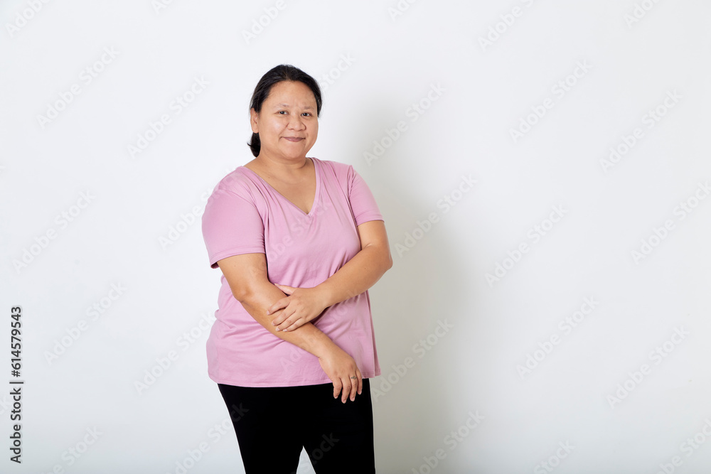 Beautiful Asian plus-size woman smiles with positive emotion, feeling ...