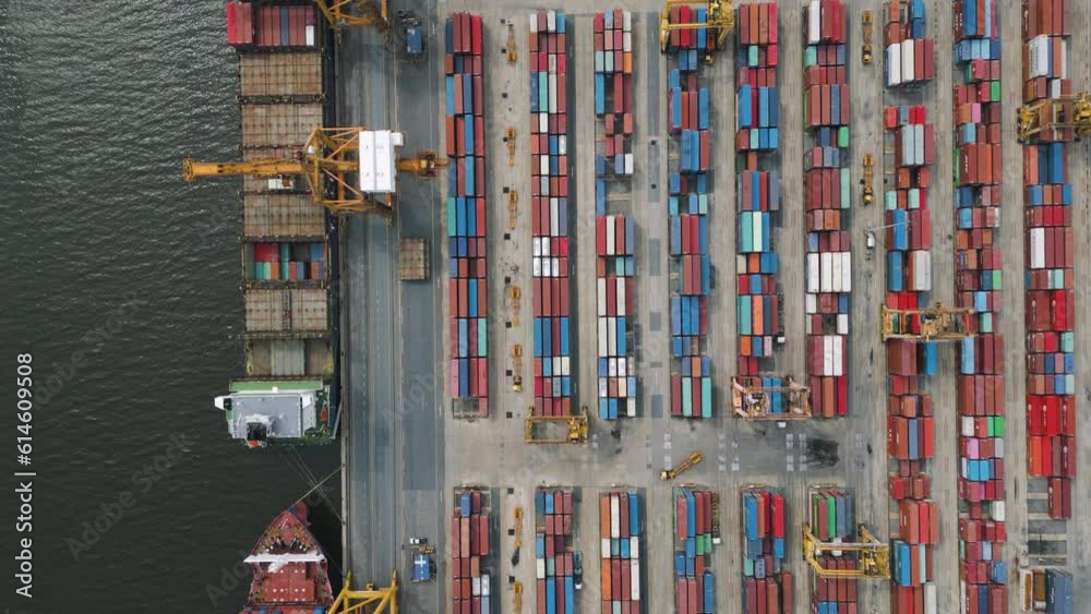 Container ship loading and unloading in deep sea port, Aerial view of ...