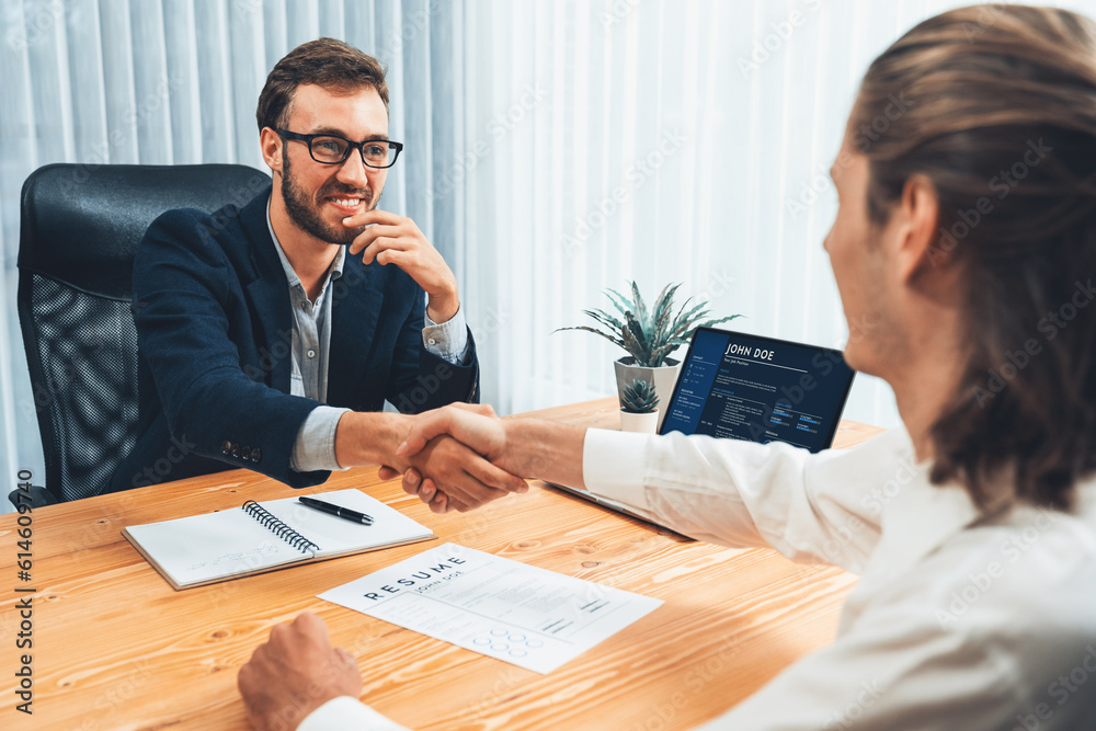 After successful meeting or job interview, two happy businessmen shake ...