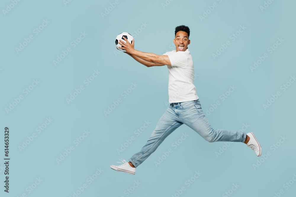 Full body side profile view fun young man fan wears t-shirt cheer up ...