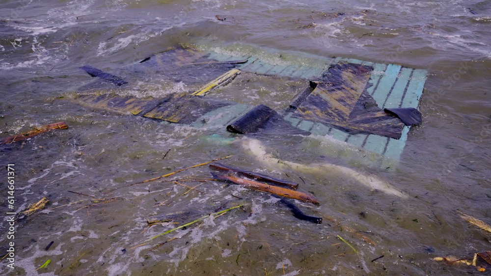 Part of wall of house floats near shore, floating debris has reached ...