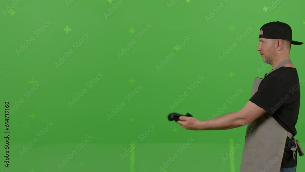 Front Side view of Caucasian male waiter hold wireless bank payment POS ...