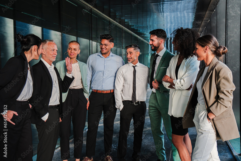 Executive businesspeople talking, having a relaxed conversation with ...