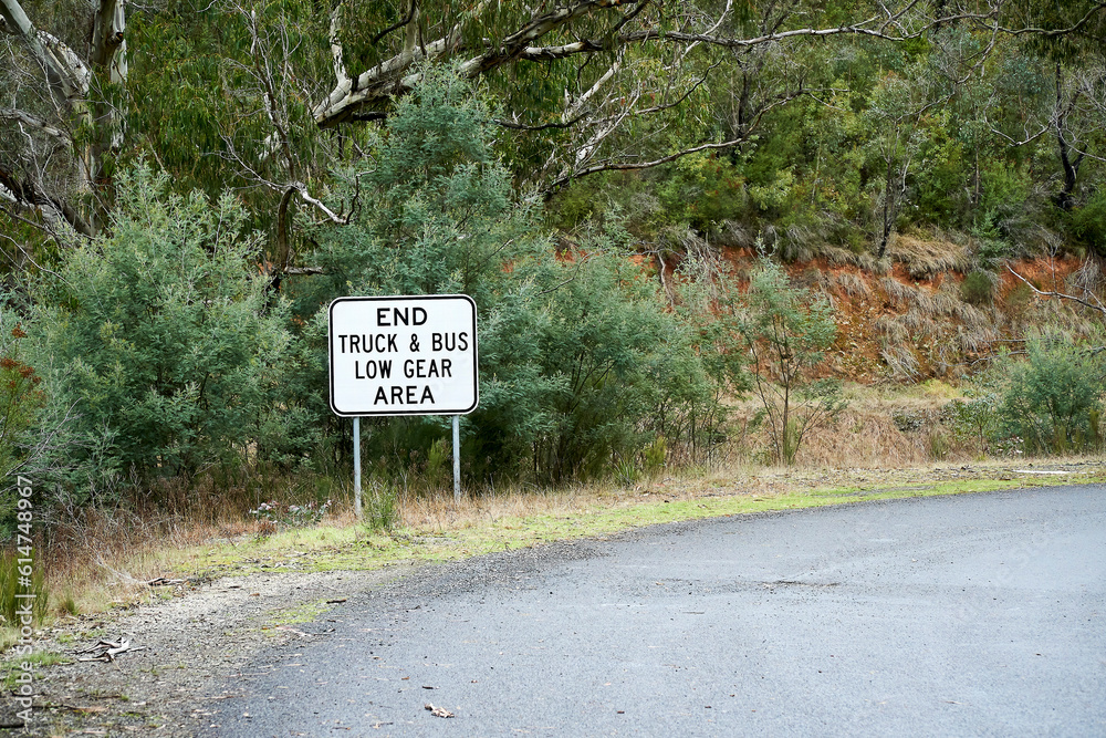 Road Sign at the end of a steep descent indicating Trucks and Buses no ...