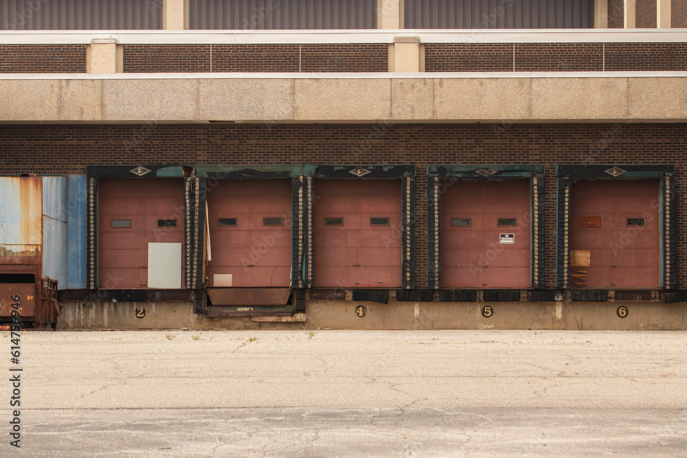 Loading dock of old out of business retro mall building background ...