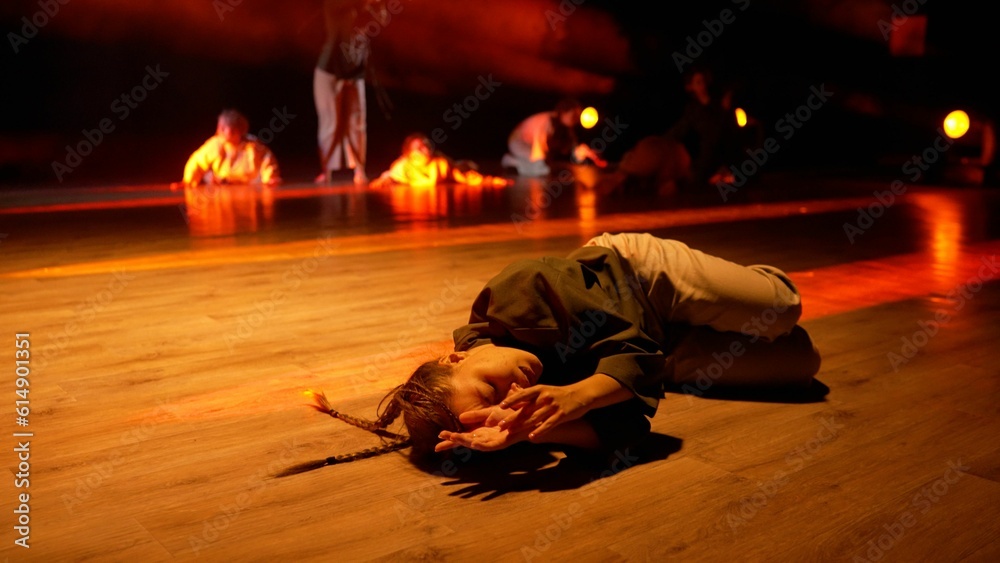 The girl is dancing on the stage. The concept of modern dance, staging ...