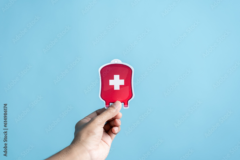 Hands holding blood drop paper cut, blood transfusion, world blood ...