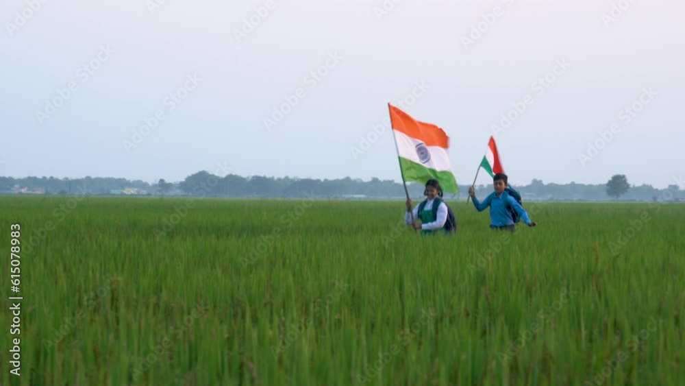 Indian children joyfully run with the national flag, celebrating their ...