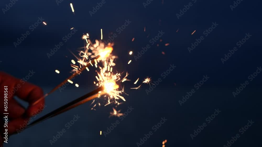 Hand holding sparklers fireworks celebration fourth of July, USA ...